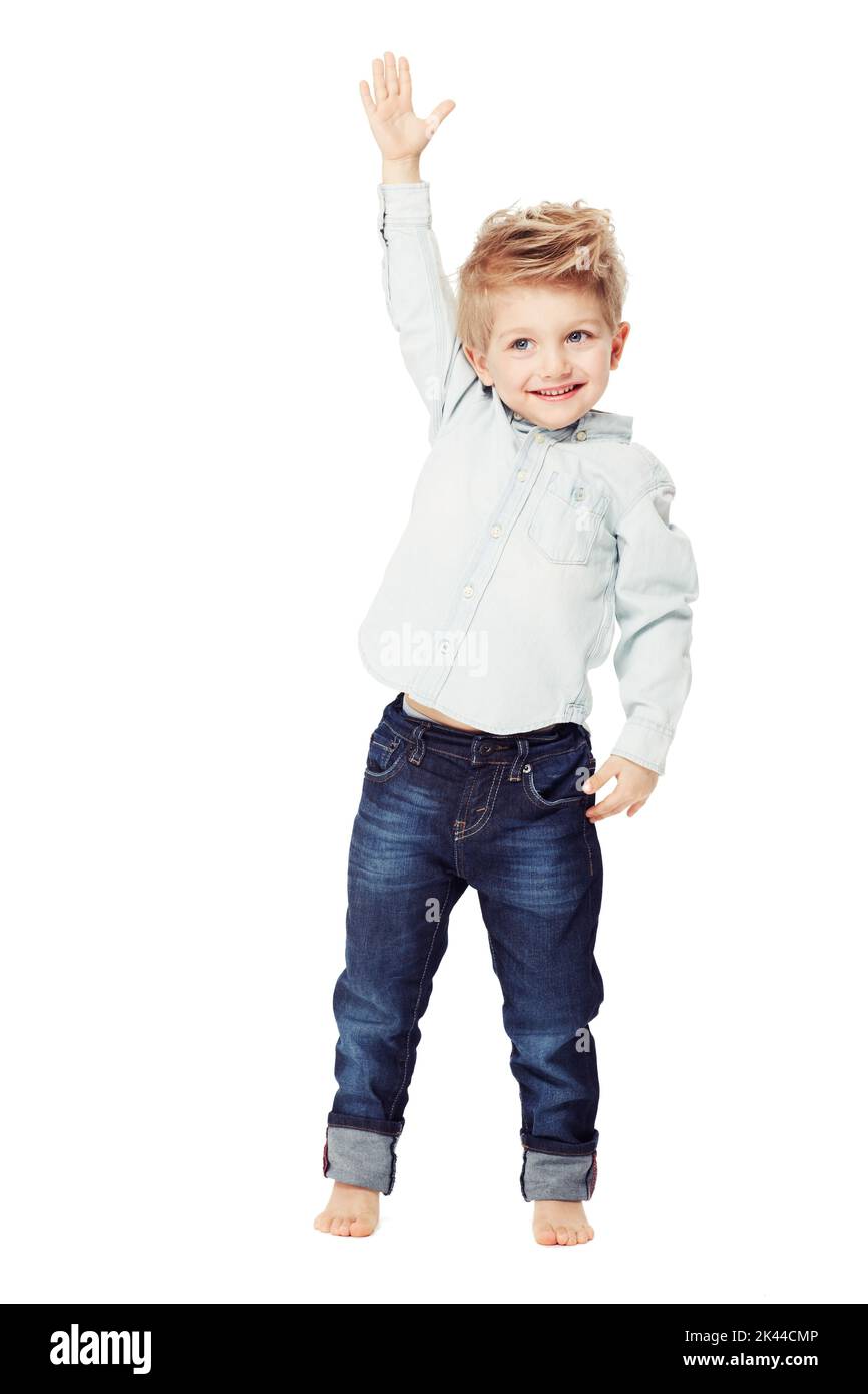 Growing up big and tall. A cute little boy reaching upwards - isolated ...