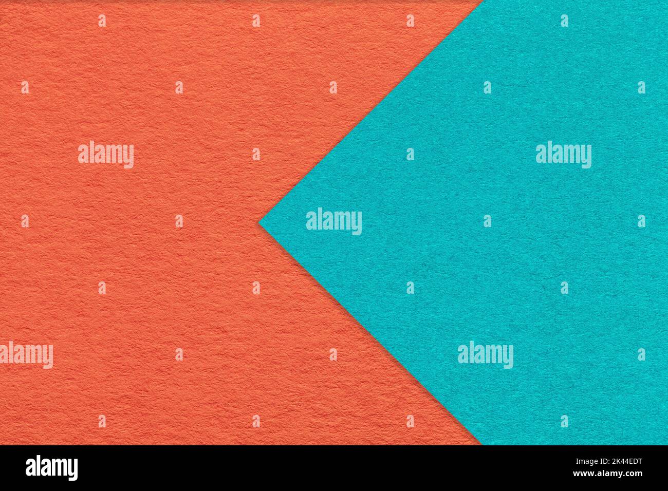 Texture of orange and cerulean paper background, half two colors with ...