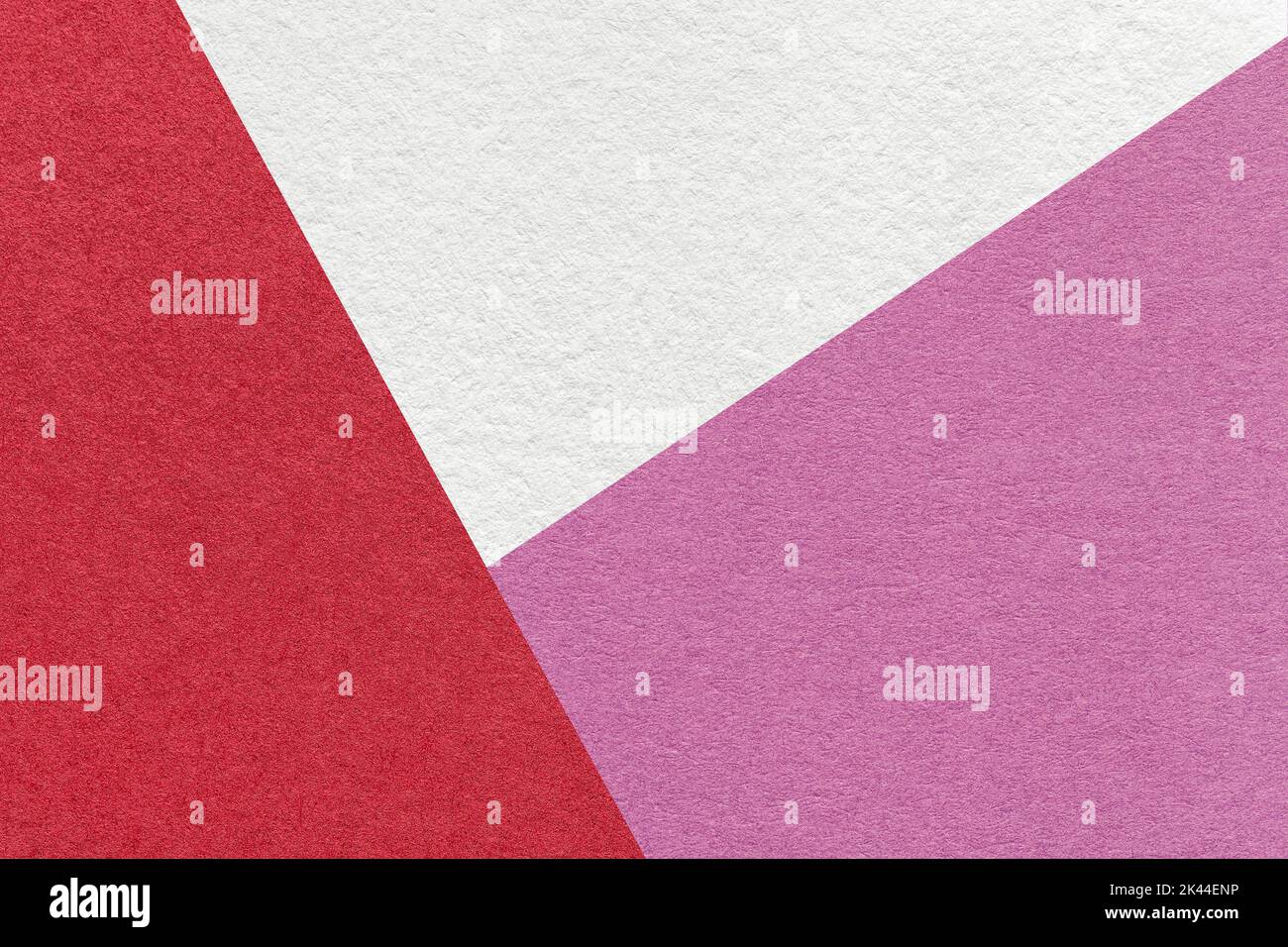 Texture of craft white, red and lilac shade color paper background ...