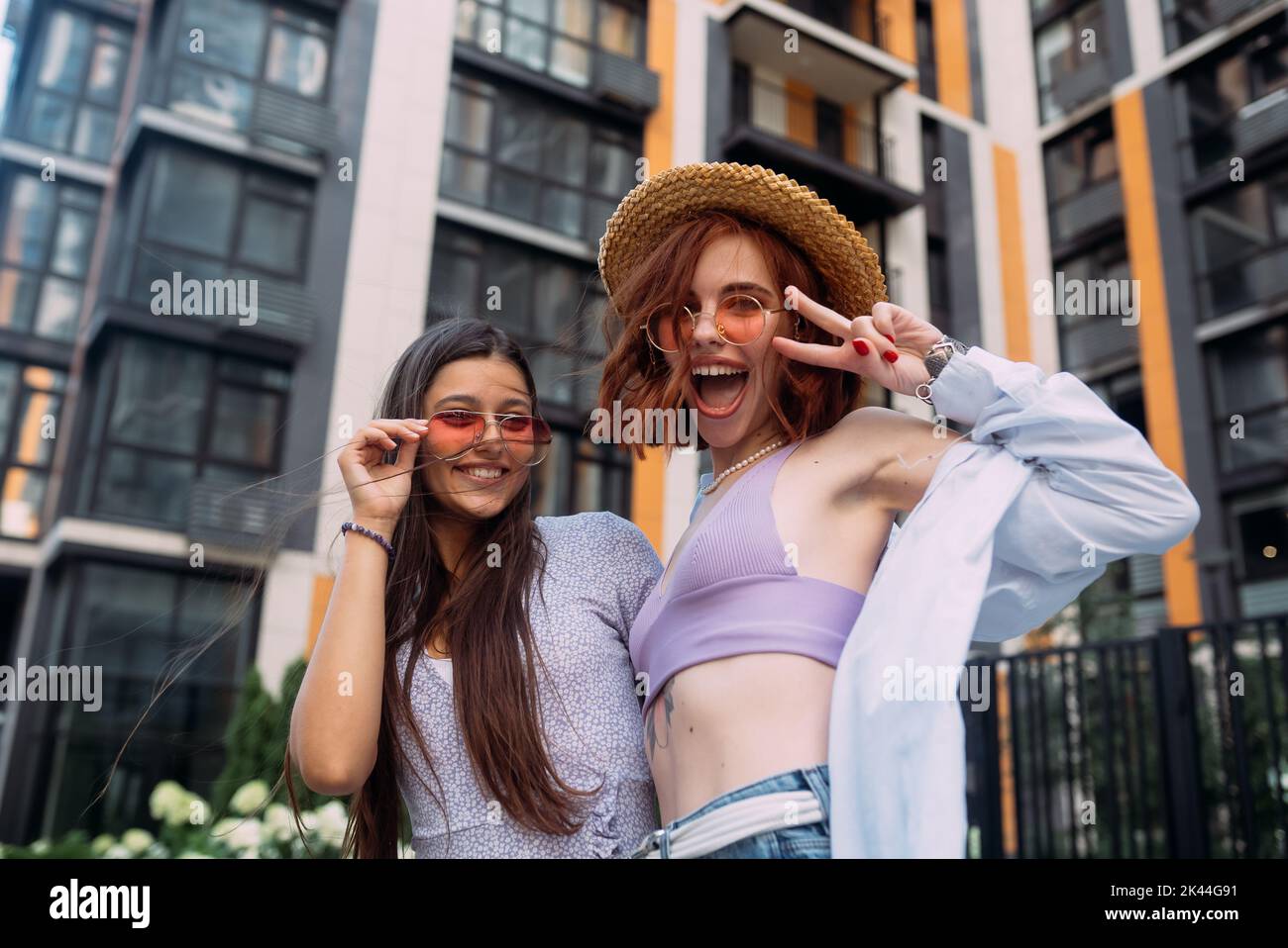 Two girlfriends having fun and fooling around Stock Photo - Alamy