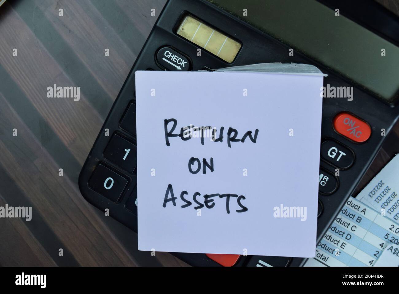 Concept of Return on Assets write on sticky notes with calculator ...