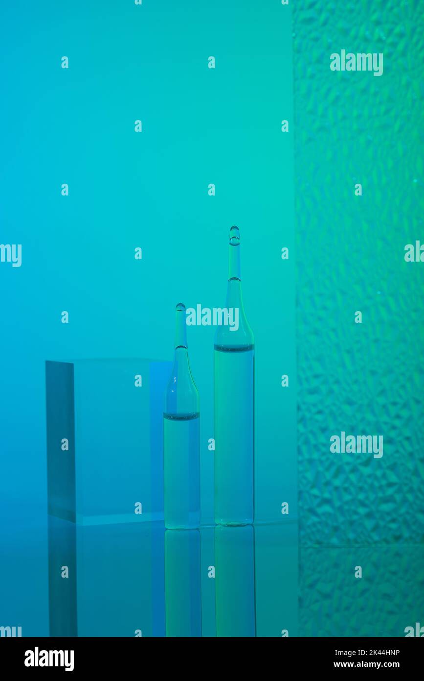 Glass ampules with serum or vitamins Stock Photo - Alamy