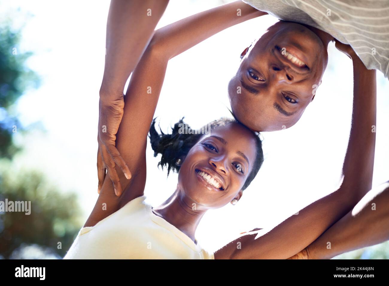 They always have fun together. A happy young african couple looking ...