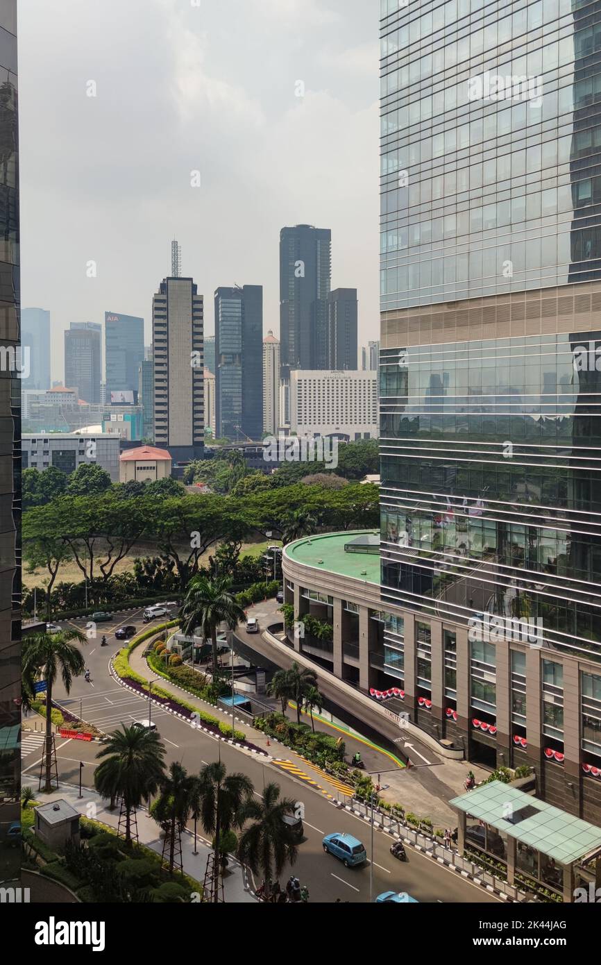 View of buildings and road traffic at SCBD in Jakarta, Indonesia with ...