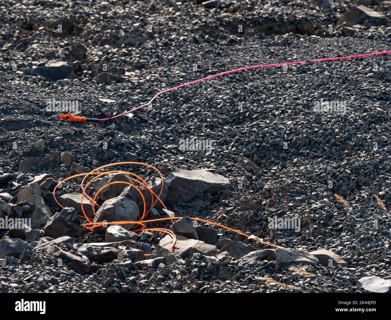 Explosive works in quarry , drilled rocks stuffed with explosives and ...