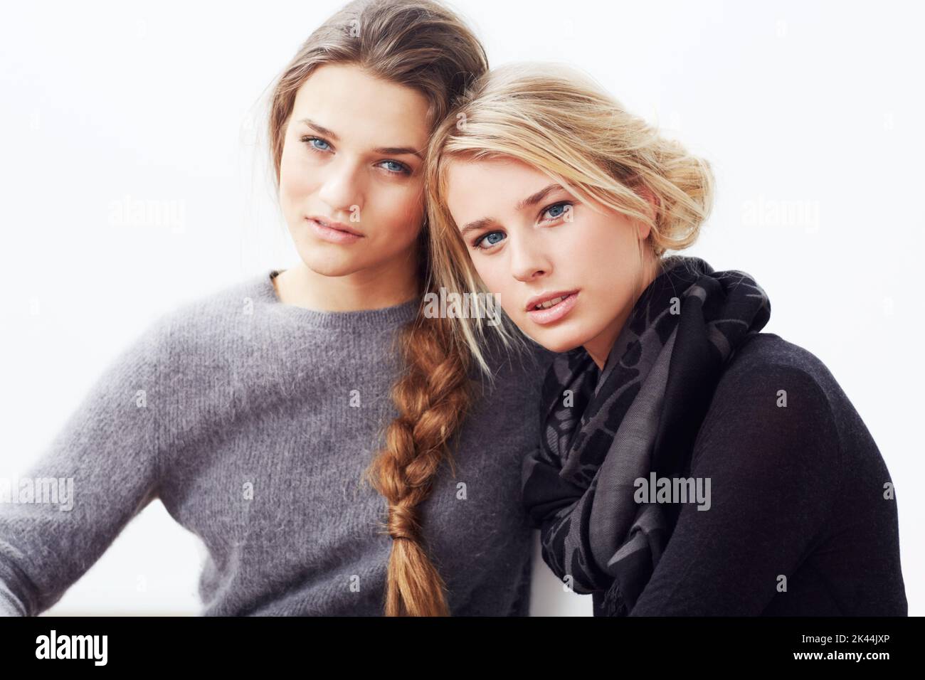 Friends since childhood. Portrait of two female friends looking at the ...