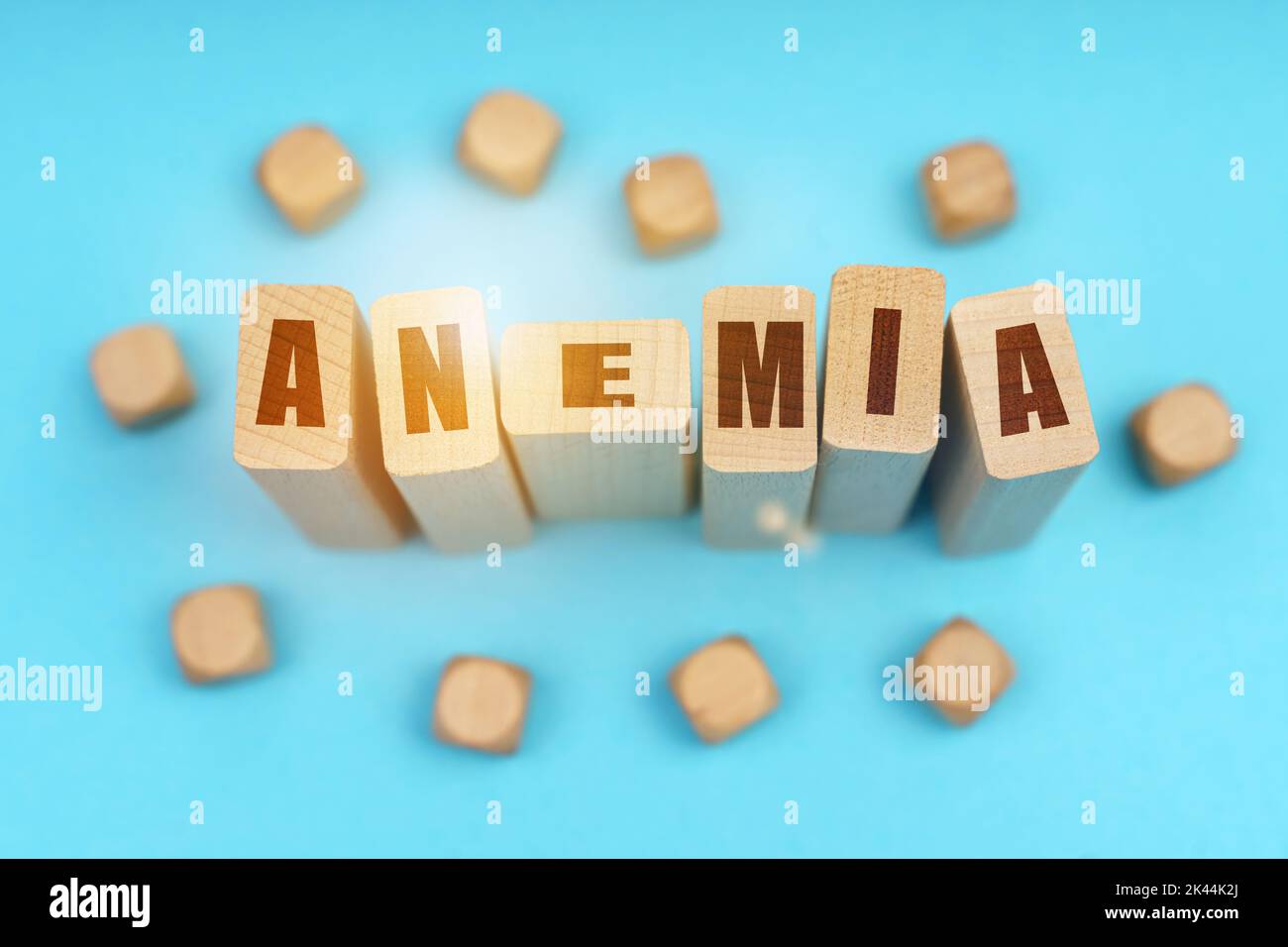 Medicine concept. On a blue background, wooden cubes and Jenga with the ...