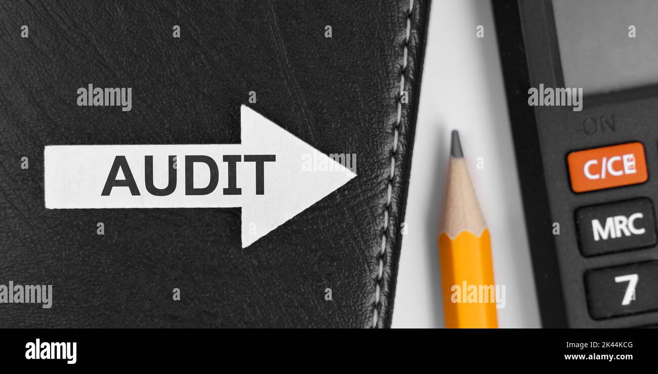 Business and finance concept. Next to the calculator and pencil there ...