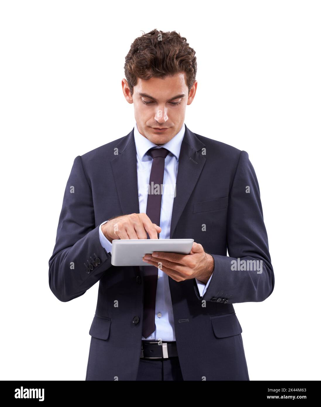Hes always connected. A handsome young businessman typing on his ...