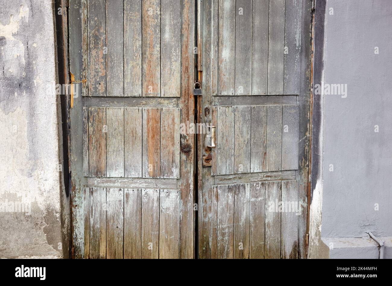 The old door to the building. Entrance to the territory in bad ...
