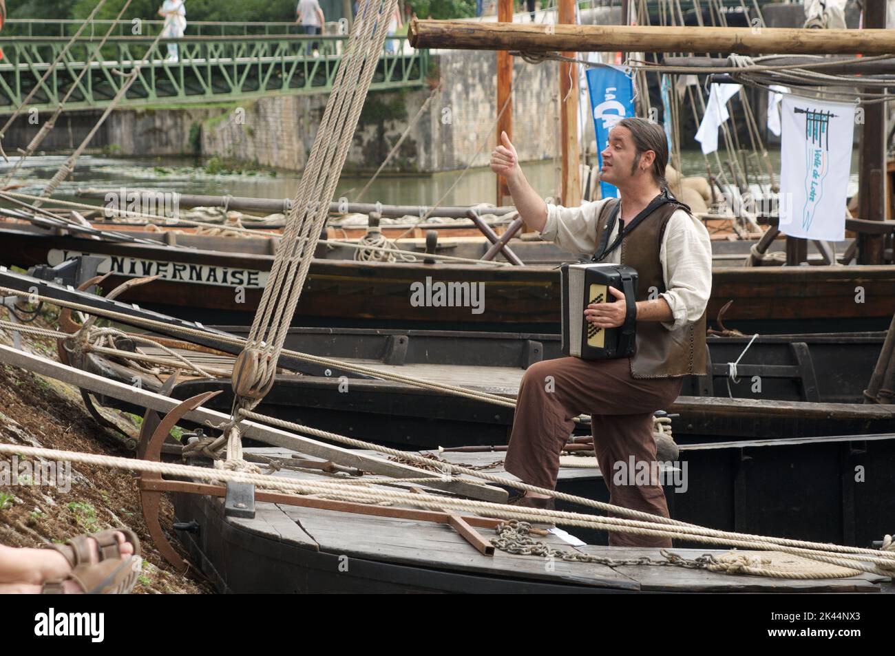 Singer in thea boat Stock Photo - Alamy
