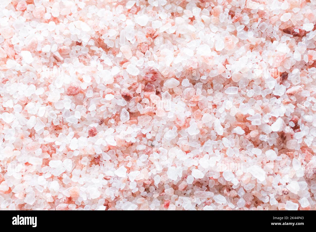 Himalayan salt texture and background for design. Close up of pink salt ...