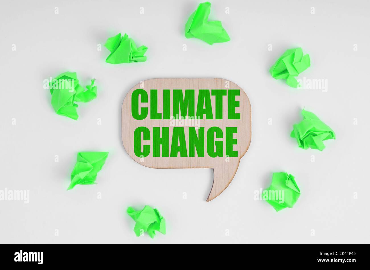 Ecology concept. On a white background, there are crumpled green pieces ...