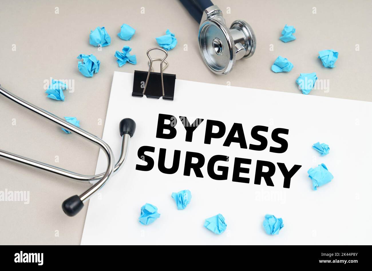 Medicine concept. On the table is a stethoscope, a pen, blue crumpled ...