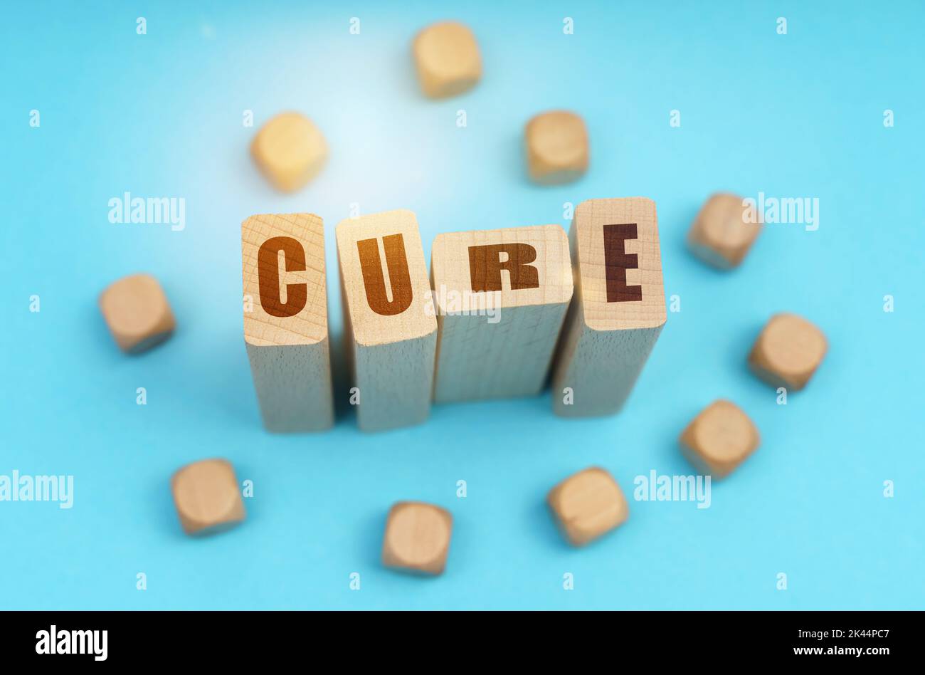 Medicine concept. On a blue background, wooden cubes and Jenga with the ...