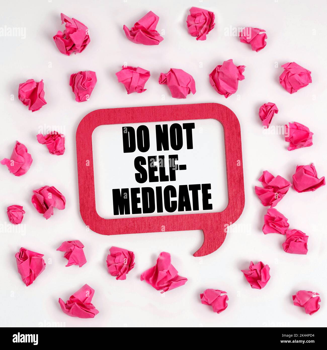 Medicine and health concept. On the table are crumpled blue pieces of ...