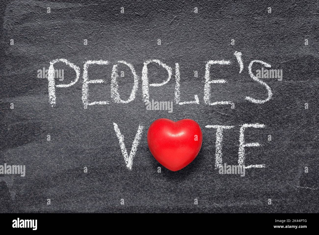 people’s vote phrase written on chalkboard with red heart symbol ...