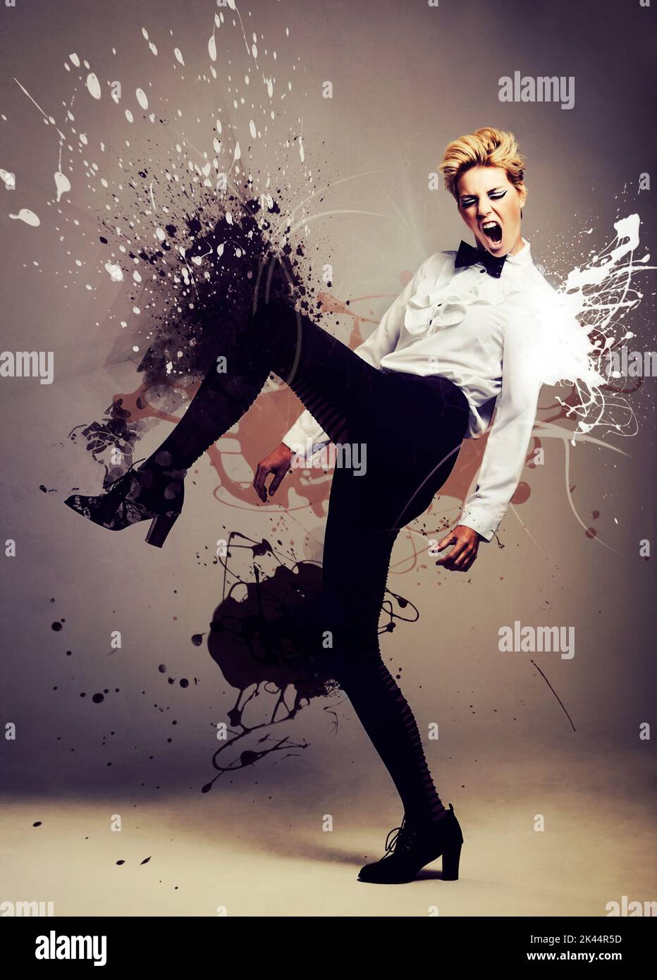 Making a splash. Studio shot of a fashion model that is digitally ...