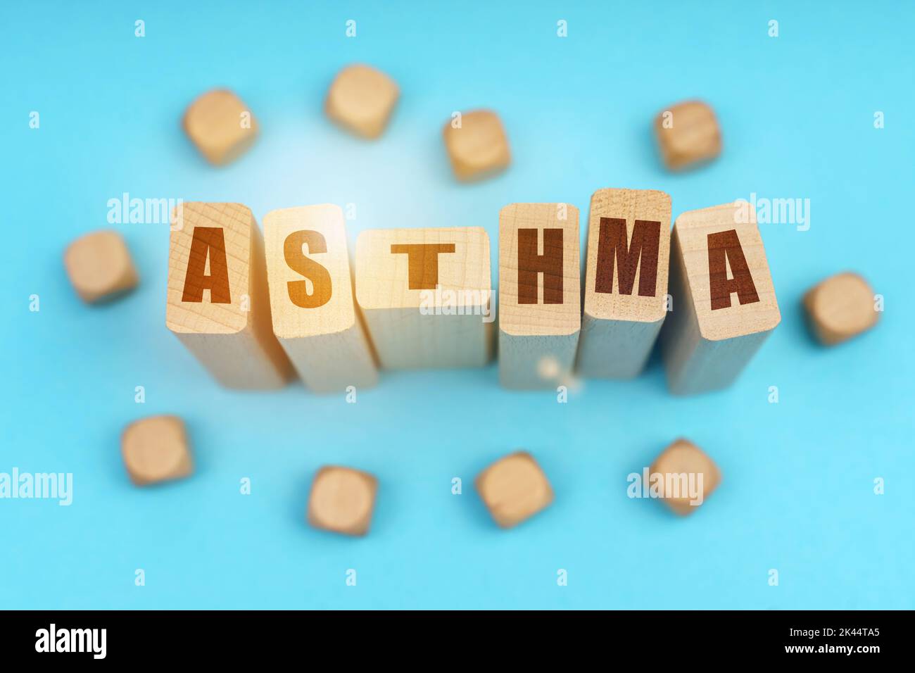 Medicine concept. On a blue background, wooden cubes and Jenga with the ...