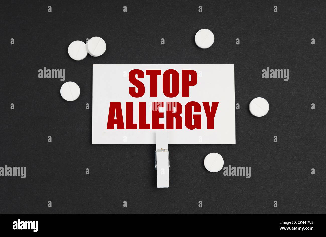 Medicine concept. On a black background, there are pills and a business ...