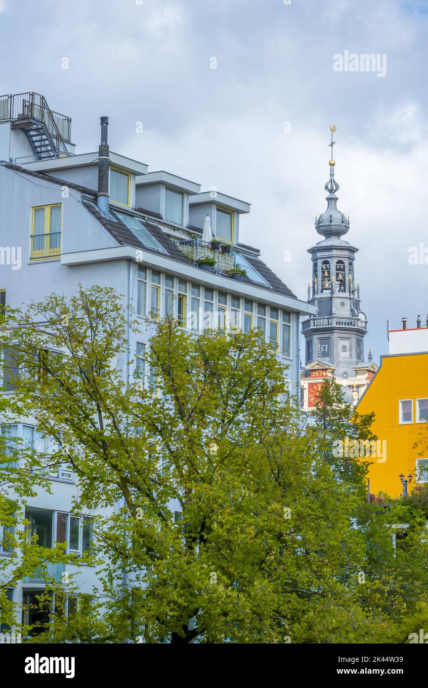 Netherlands. Cloudy summer day in Amsterdam. Roofs of houses and the ...