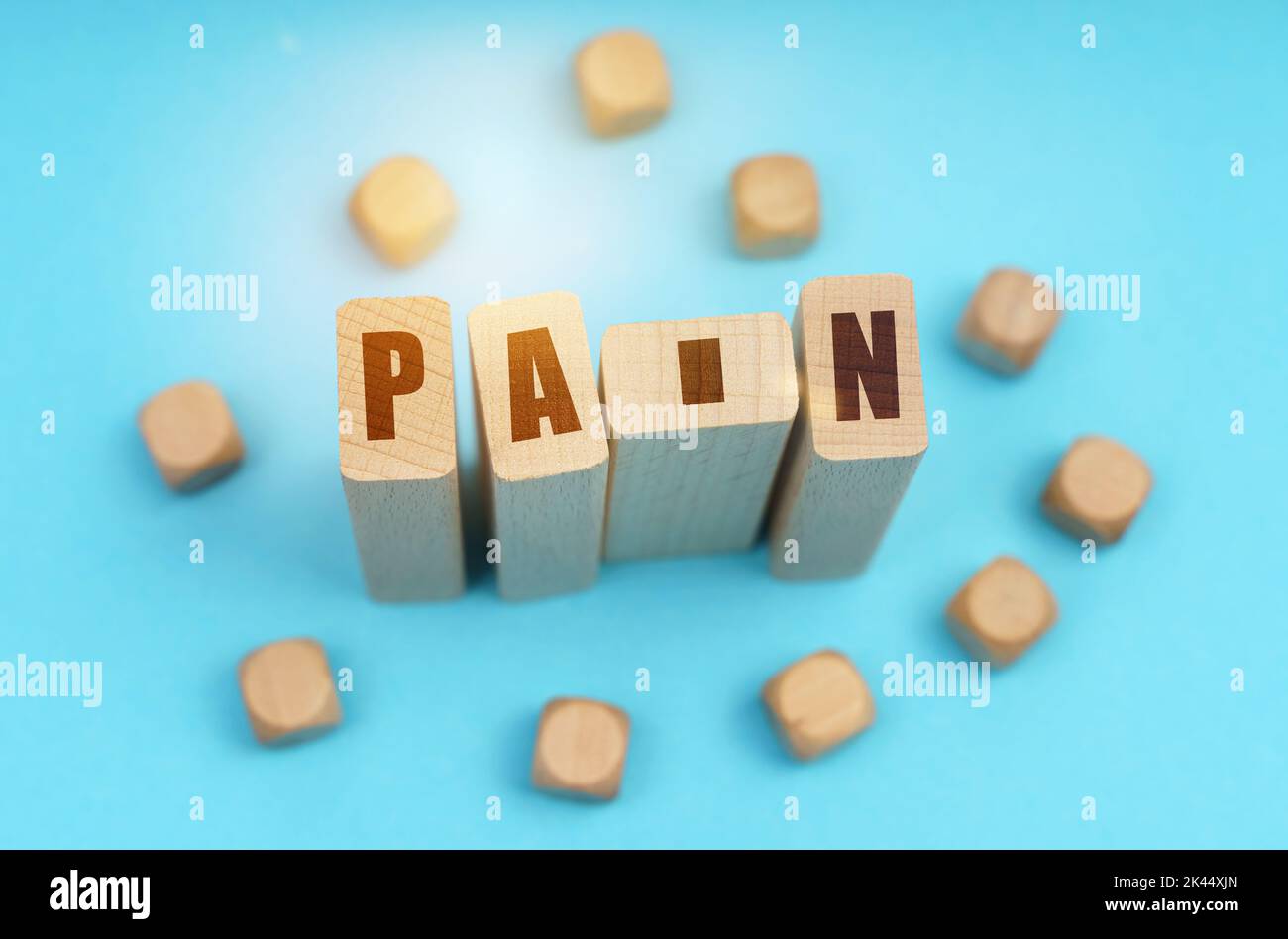Medicine concept. On a blue background, wooden cubes and Jenga with the ...