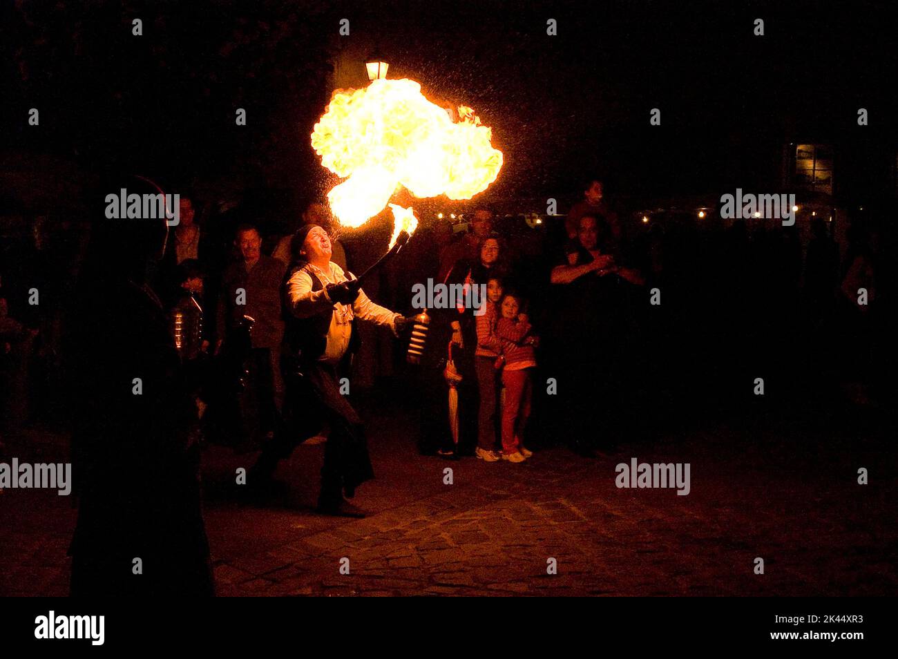 Fire performer in action Stock Photo - Alamy