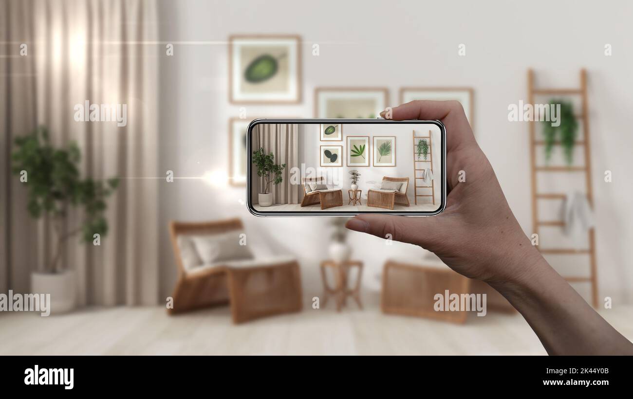 Hand holding smart phone, AR application, simulate furniture and ...