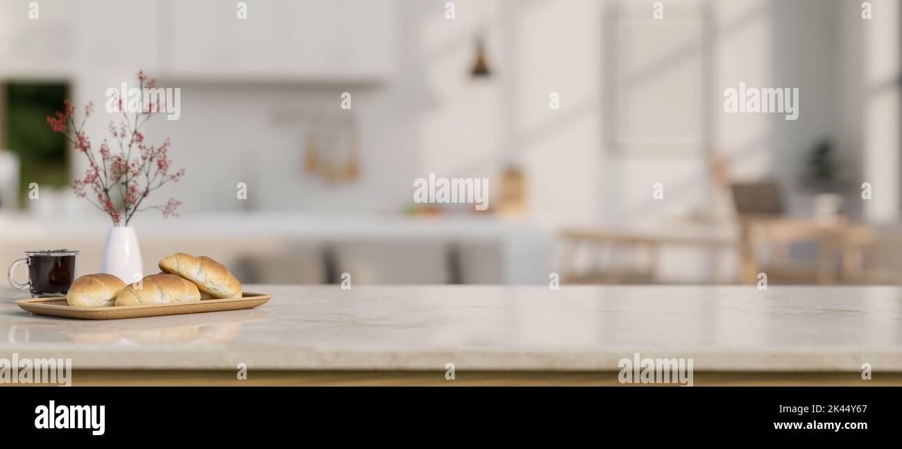 Luxury marble kitchen tabletop with bread basket, a cup of coffee ...