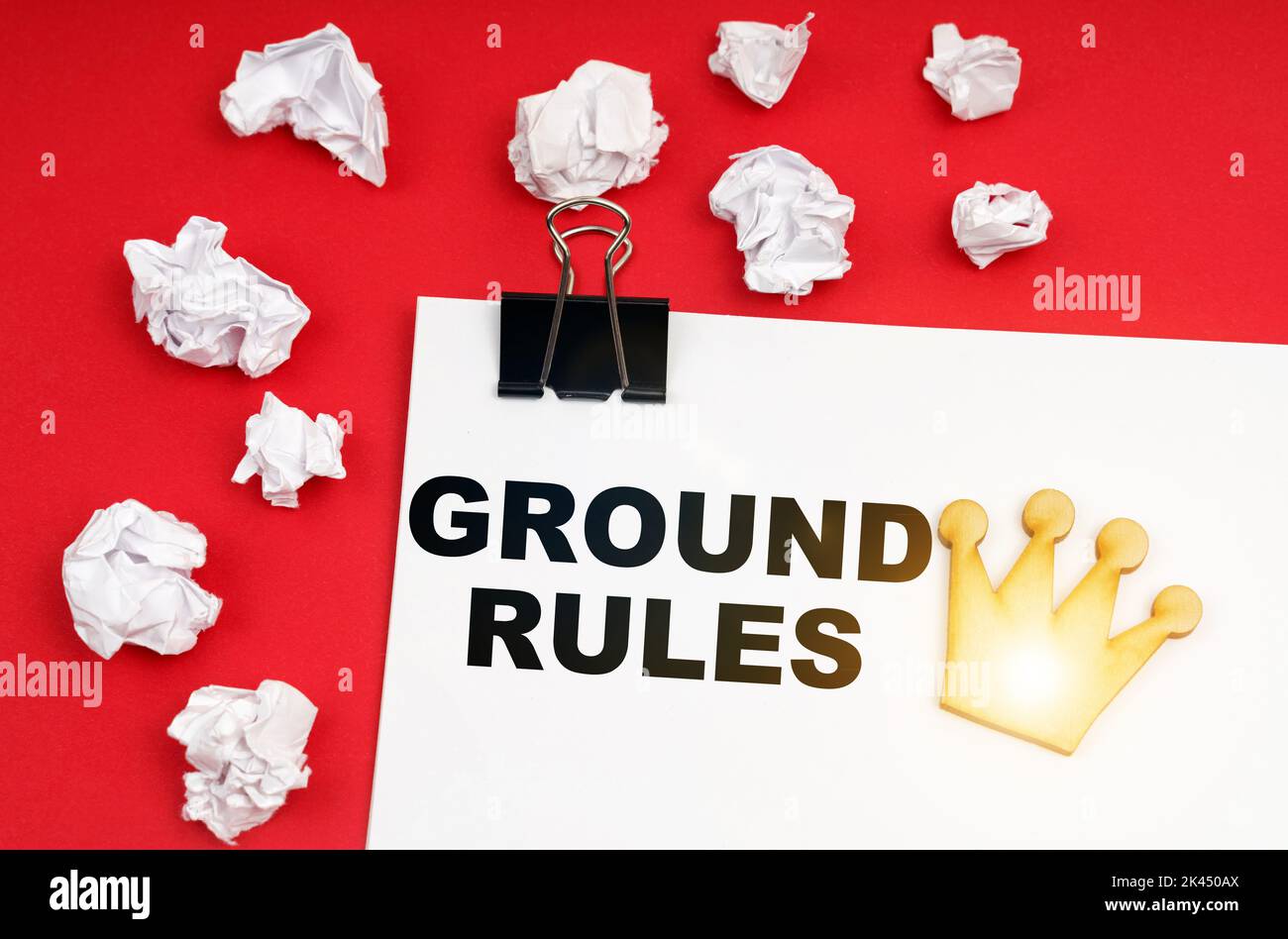 Business and finance concept. On a red background in crumpled paper and ...