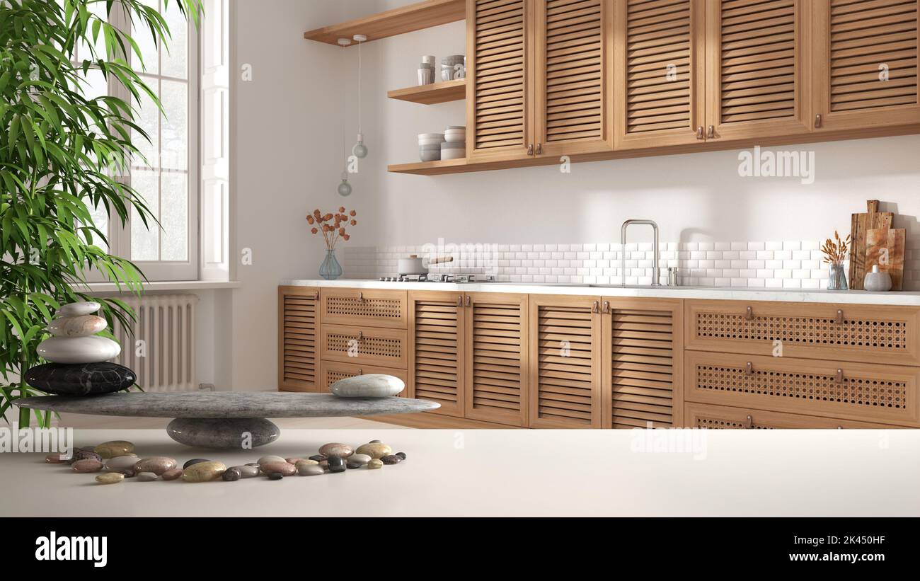 White table shelf with pebble balance and 3d letters making the word ...