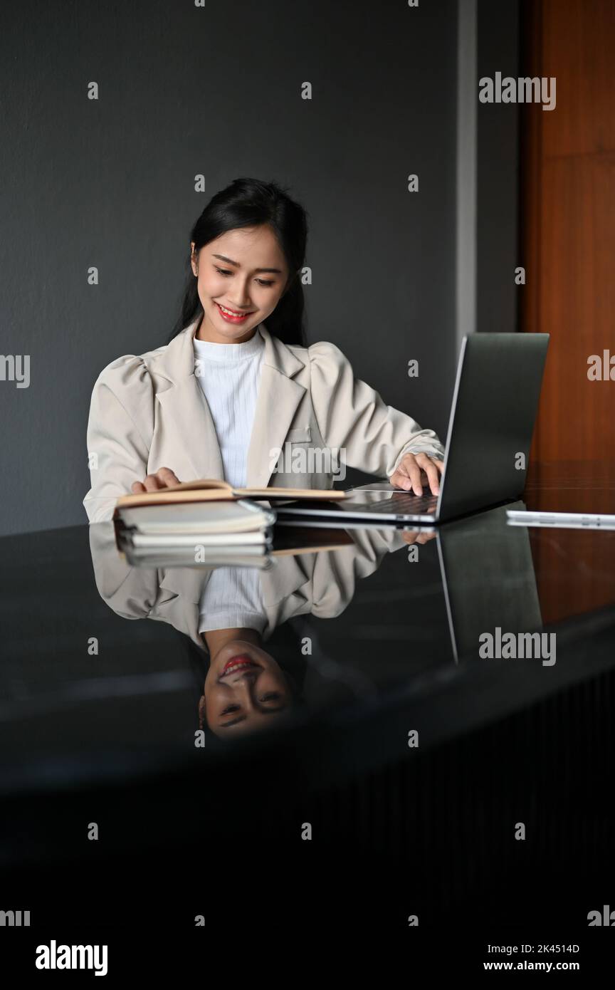 Portrait, Gorgeous millennial Asian businesswoman or female manager ...