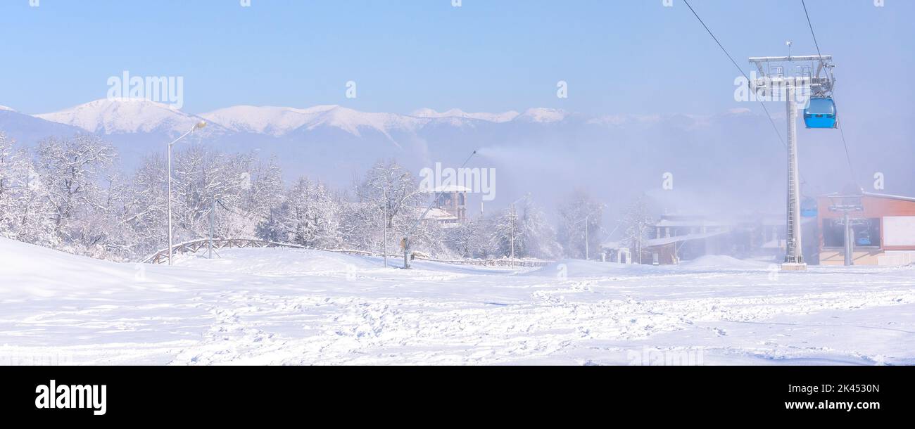 Bansko, Bulgaria winter ski resort panorama with blue gondola lift ...