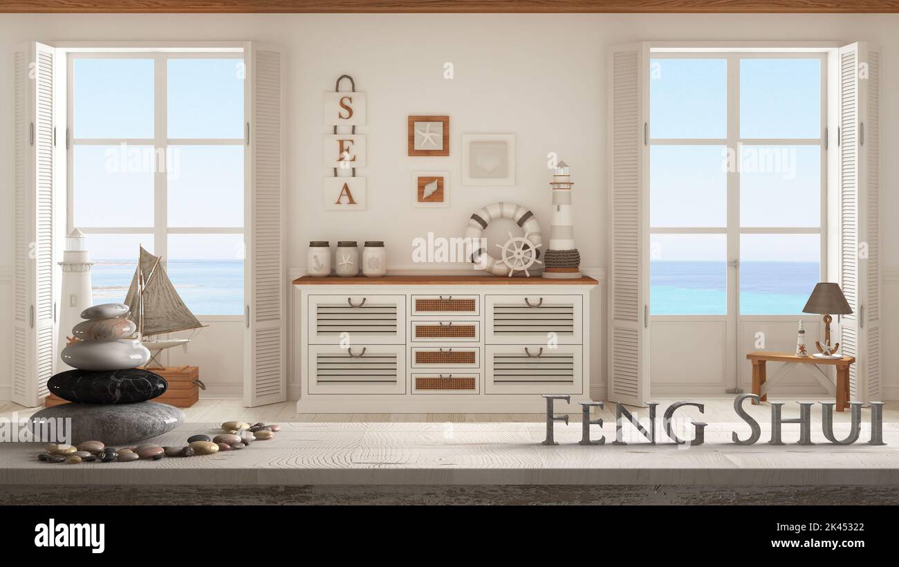 White table shelf with pebble balance and 3d letters making the word ...