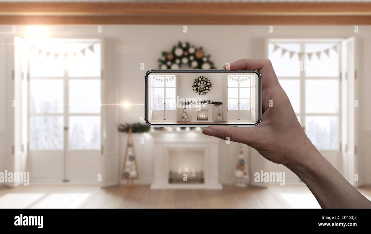 Hand holding smart phone, AR application, simulate furniture and ...