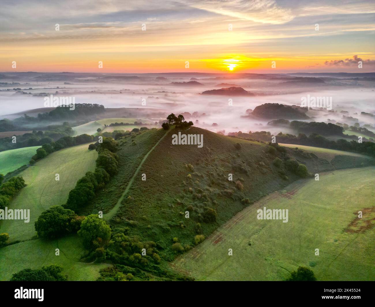 View from the air of a misty autumn sunrise at Colmers Hill at ...