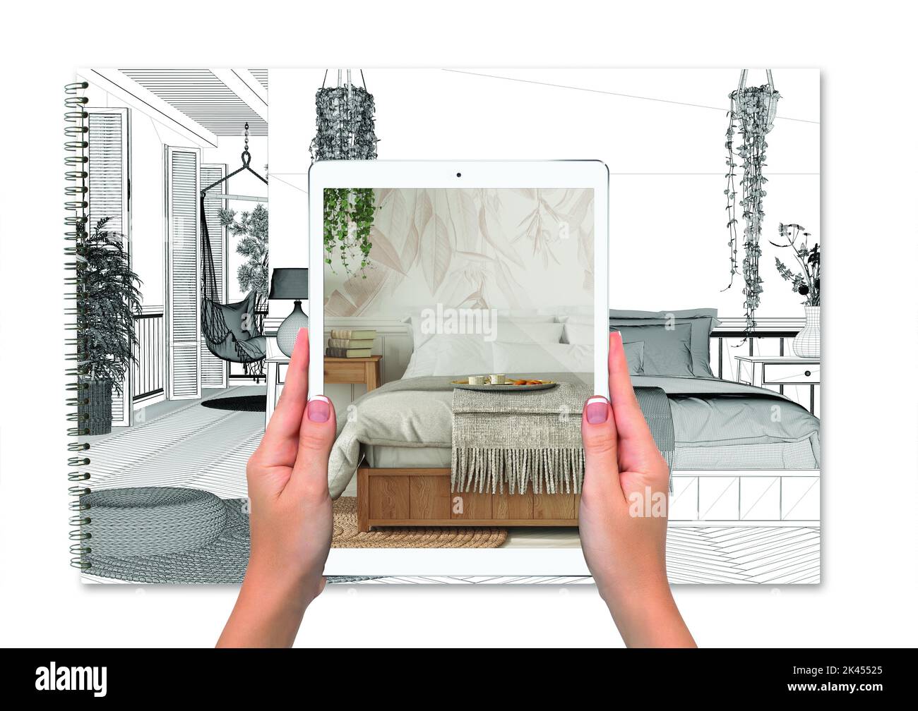 Hands holding tablet showing bedroom in boho style, total blank project ...