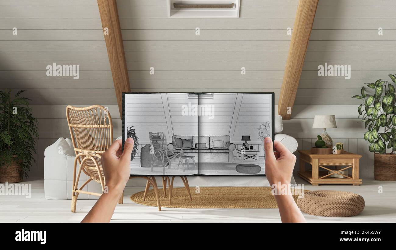 Hands holding notepad with boho style living room blueprint sketch or drawing. Real interior ...