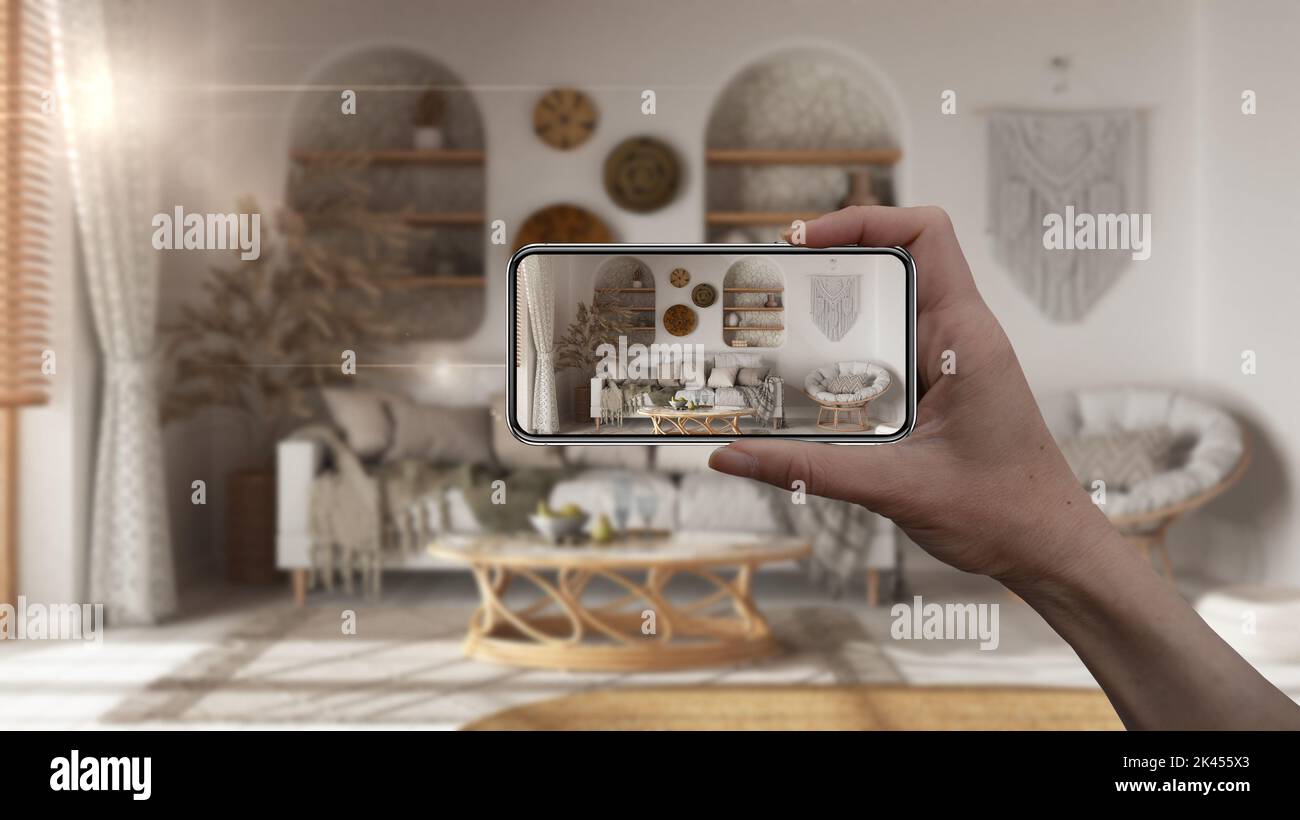 Hand holding smart phone, AR application, simulate furniture and ...