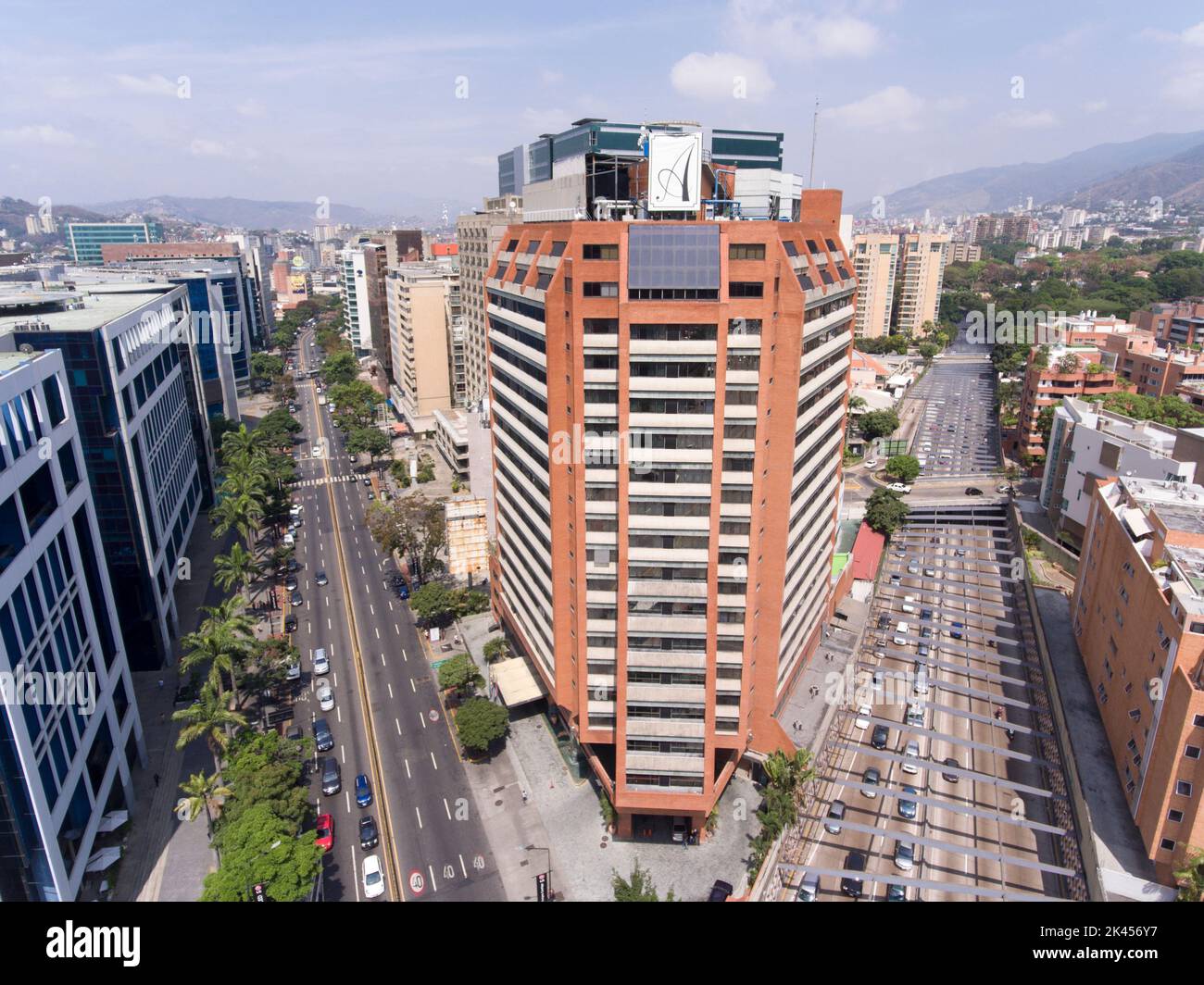 The Ambassador Suites Hotel Caracas with the cityscape of Miranda ...