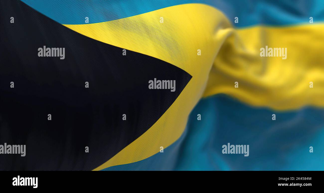 Close-up view of the Bahamas national flag waving in the wind. The ...