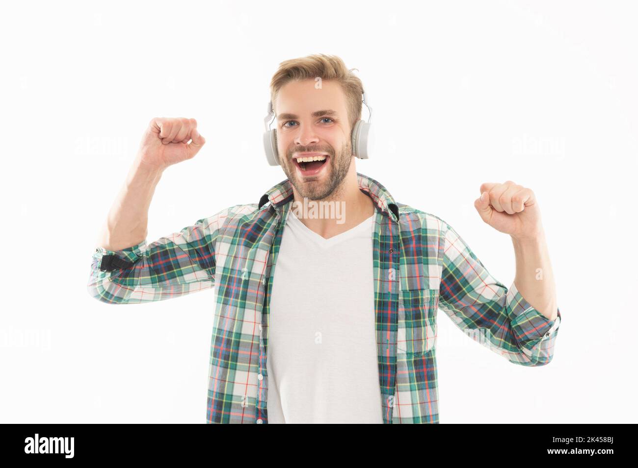 Happy man enjoy music isolated on white studio. Carefree man listening ...