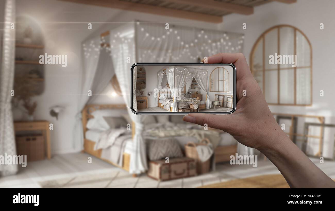Hand holding smart phone, AR application, simulate furniture and ...