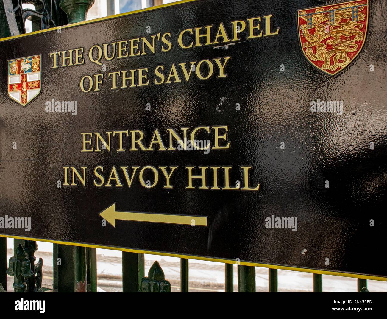 Metal plaque with crests on the gates of the Queen's Chapel of the ...