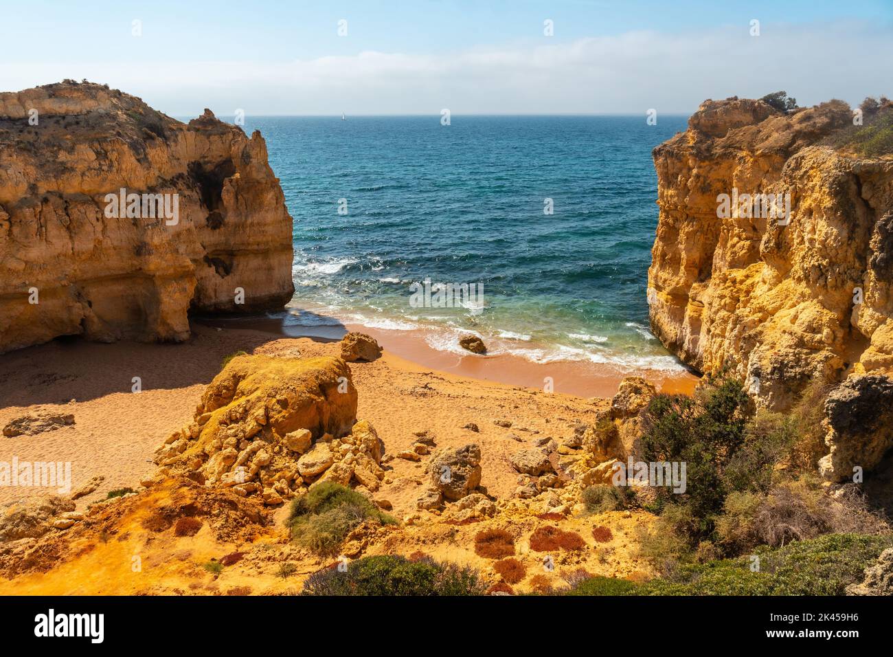 An aerial view of beach surrounded by cliffs at beach Coelha Stock ...
