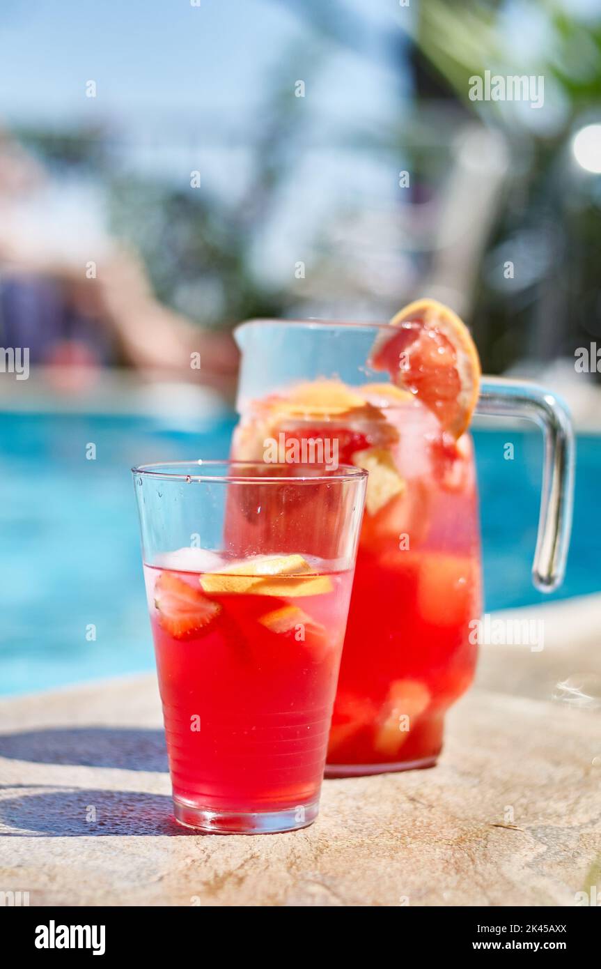 fruit cocktails by the pool Stock Photo - Alamy