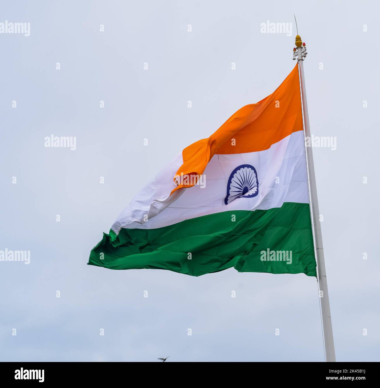 India flag flying high at Connaught Place with pride in blue sky, India ...