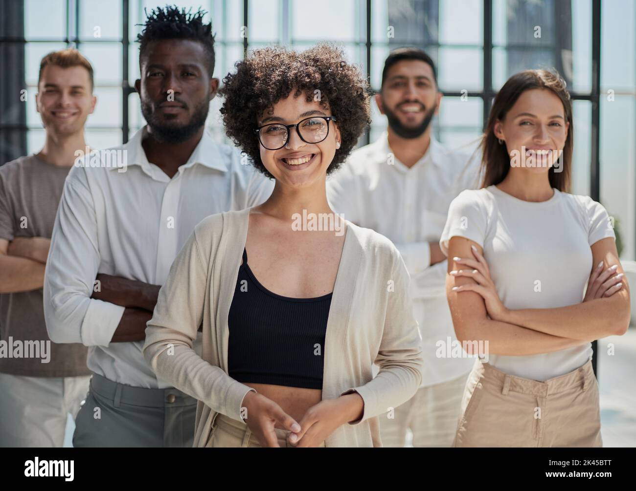 Smiling professional business leaders and employees group team portrait ...