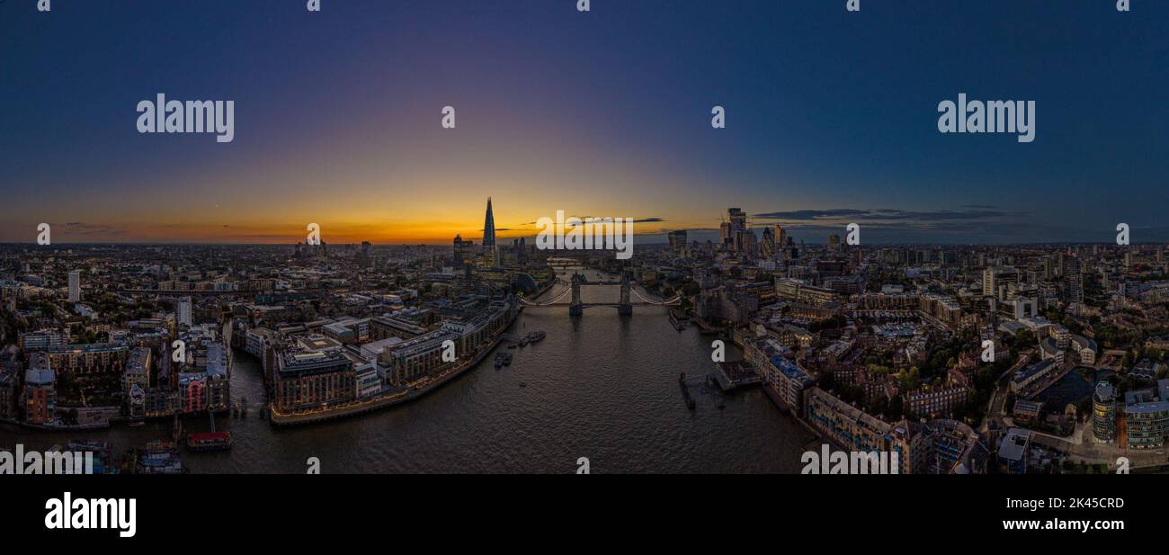 Aerial view of Tower Bridge and London City at night, London, United ...
