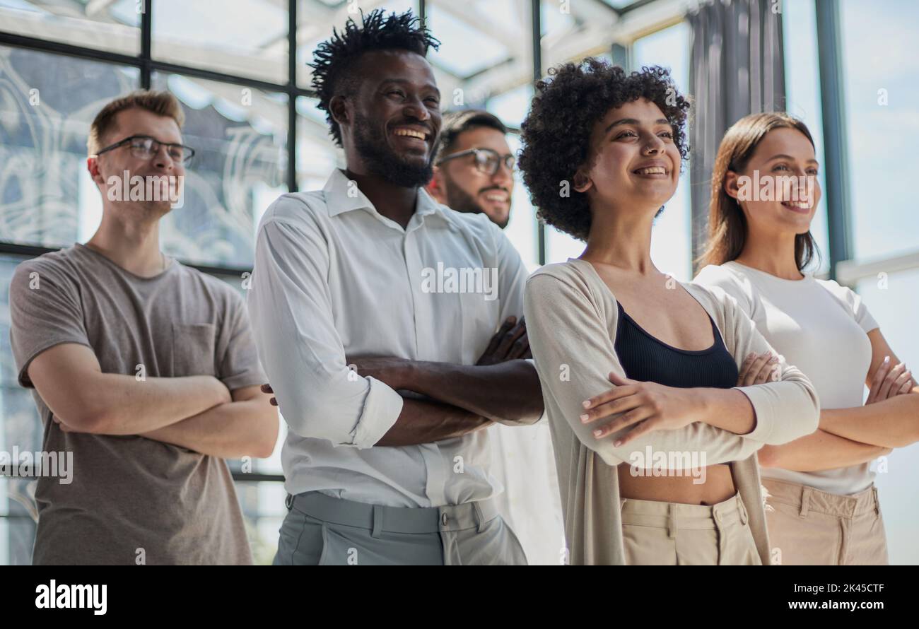 Smiling professional business leaders and employees group team portrait ...